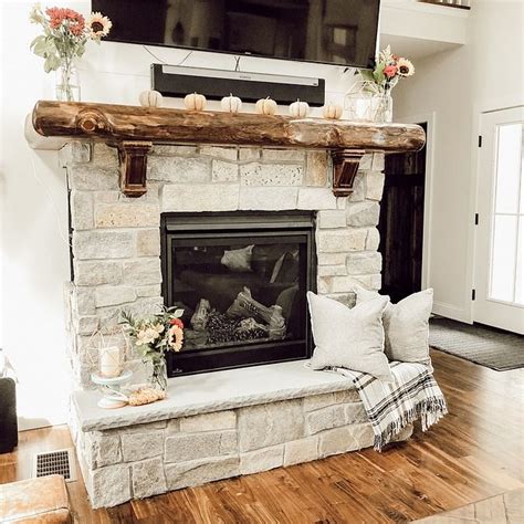 Log Mantel A Custom Log Mantel Adds A Rustic Feel To This Stone