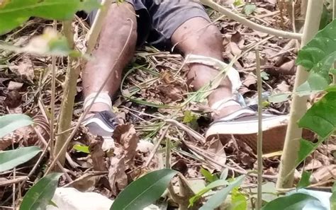 Corpo amordaçado as mãos e os pés amarrados é encontrado à margem