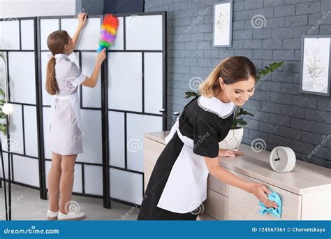 Professional Chambermaids In Uniform Cleaning Up Stock Image Image Of Cleaner Housework