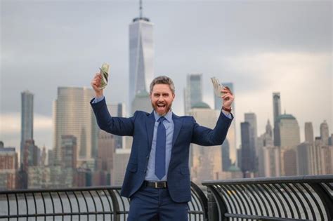 Premium Photo Winner Dollars Businessman With Dollars Money Excited