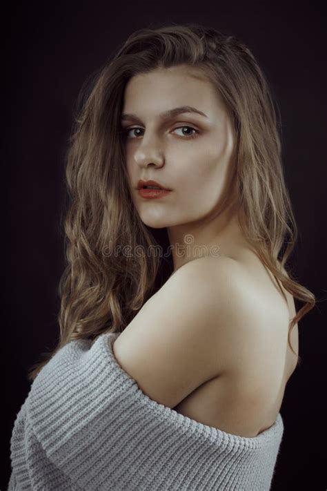 Beautiful Naked Woman On A Chair In The Dark Room Stock Image Image