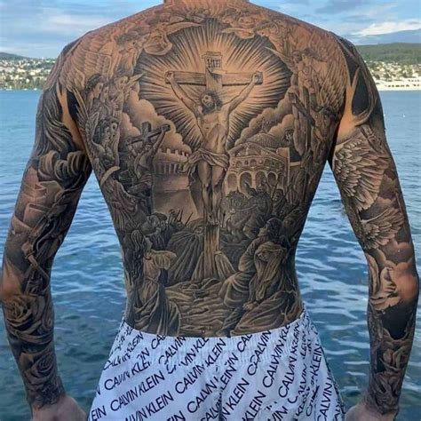 Cross Tattoo Design Ideas To Keep Your Faith Close Chest Tattoo