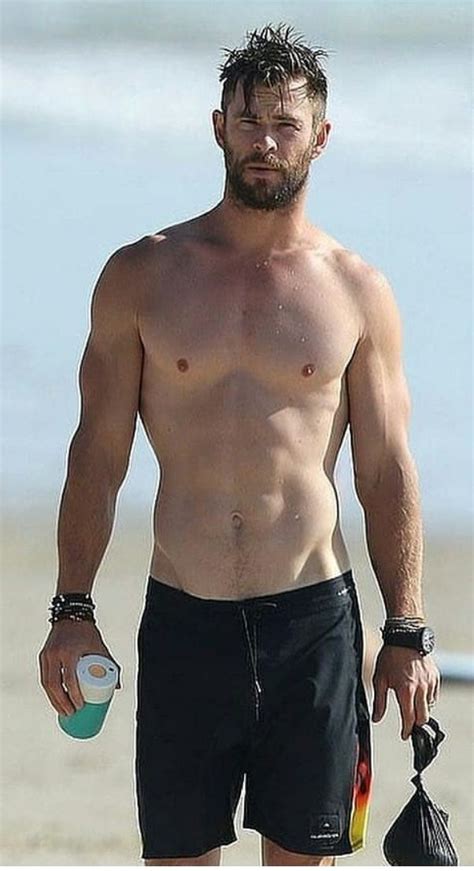 Here Are Some Shirtless Photos Of Chris Hemsworth To Help You Make It