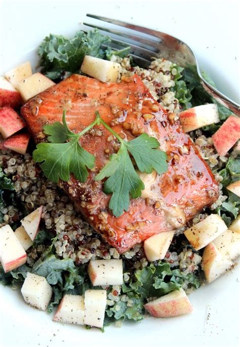 A White Bowl Filled With Meat And Vegetables
