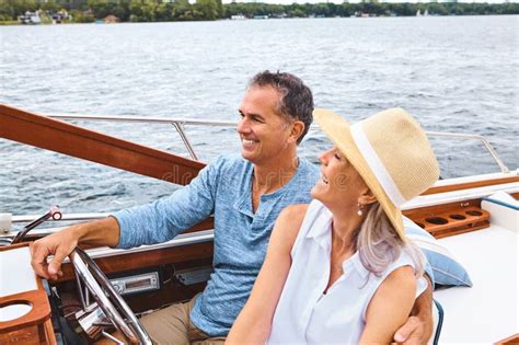 Life Is One Luxurious Boat Ride A Mature Couple Enjoying A Relaxing Boat Ride Stock Image