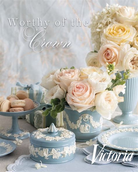 A Table Topped With Blue Dishes Covered In Flowers