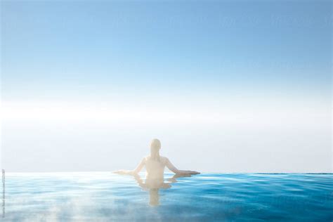 Woman In Infinity Pool By Stocksy Contributor Trinette Reed Stocksy