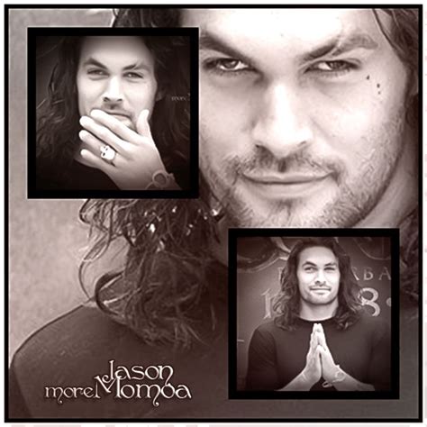 A Man With Long Hair Wearing A Black Shirt And Holding His Hands