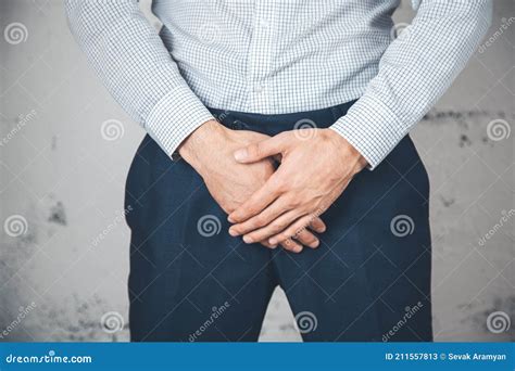 Man Holding His Urethra In Pain Man With Naked Torso Experience