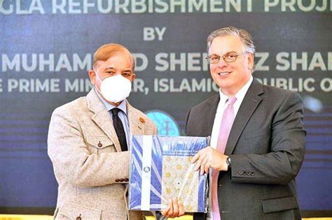 US Ambassador Donald Blome Presents A Souvenir To Prime Minister