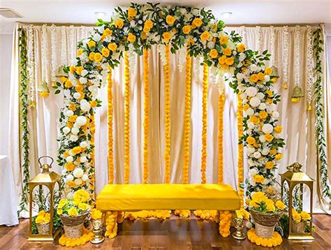 Yellow White Floral Haldi Setup Party Decorations In Delhi NCR