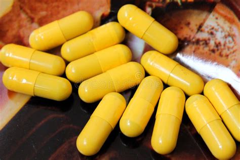 Yellow Capsules Stock Image Image Of Help Capsule Health 27701215
