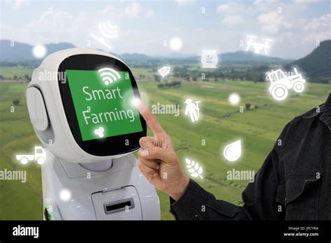 Iot Internet Of Things Agriculture Concept Farmer Use Smart Robot To