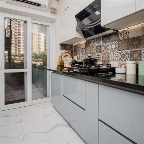 Compact Kitchen Design With Grey And White Storage Units Livspace