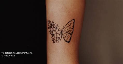 Half Butterfly Half Flower Tattoo On The Bicep