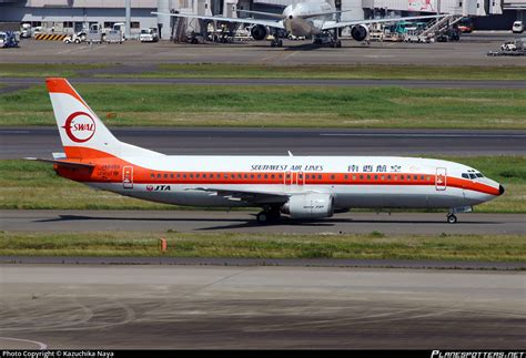 JA8999 Japan Transocean Air Boeing 737 446 Photo By Kazuchika Naya ID