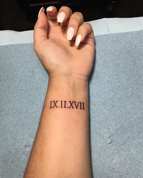 Roman Numerals Tattoo Designs On Wrist