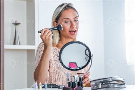 Beauty Woman Applying Makeup Beautiful Girl Looking In The Mirror And