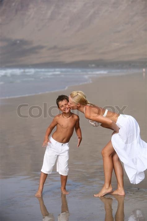 Mother And Son On The Beach Stock Photo Colourbox