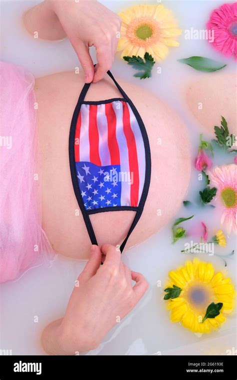 Pregnant Woman Belly In White Bathroom With Face Mask N Ffp And Usa