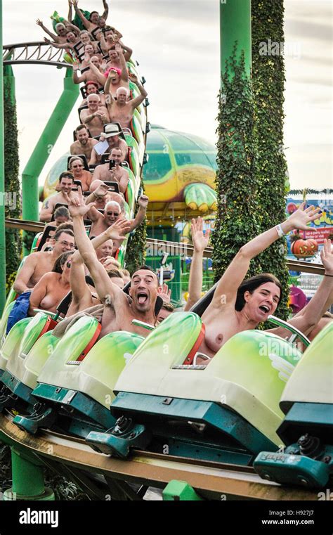 Naked Thrill Seekers Ride The Green Scream Roller Coaster On A Very