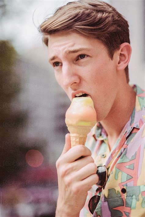 Man Eating Ice Cream By Stocksy Contributor CWP LLC Stocksy