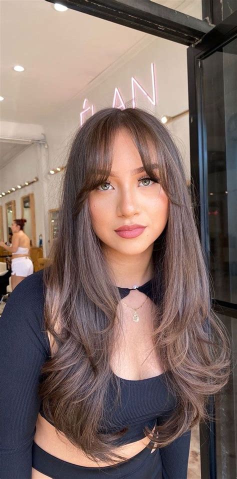 40 Long Layered Haircuts To Try Right Now Wispy Bangs Long Layers