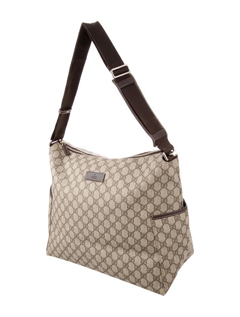 Gucci GG Supreme Diaper Bag Handbags GUC145604 The RealReal