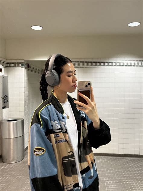 Racer Jacket Sony Headphones Slicked Back Hair Ponytail Braid Blue