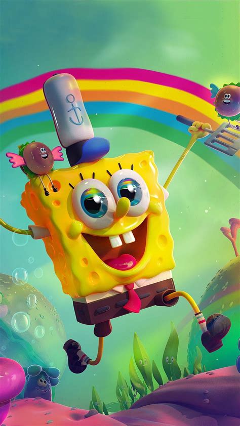 Spongebob Jumping In The Air With Rainbows And Clouds Behind Him While