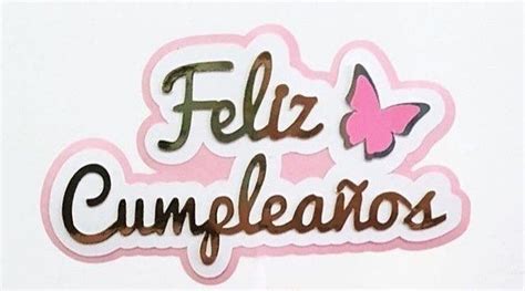 A Cake Topper With The Words Feliz Cumpleanos On It