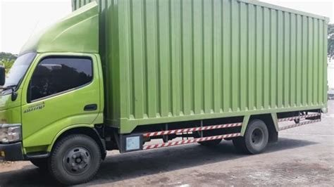 Jasa Sewa Truk CDD Tronton Fuso Untuk Cargo Darat Yosua Logistik