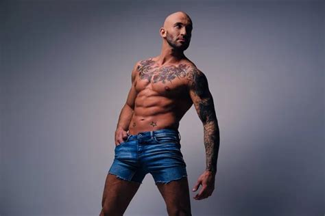 Muscular Man With Tattoos On His Torso Stock Photo By Fxquadro 151187508