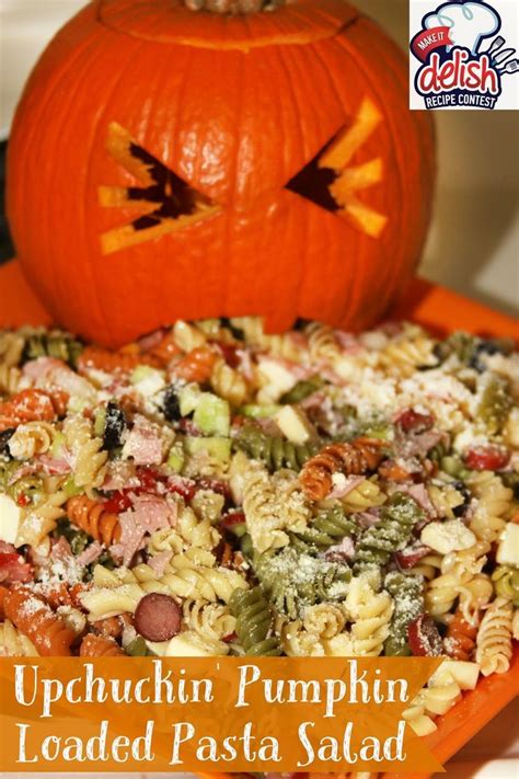 A Pumpkin Sitting On Top Of A Plate Filled With Pasta