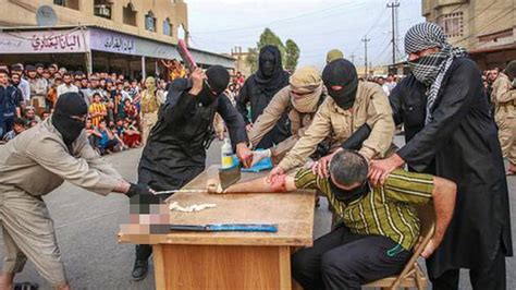 Isis Sickening Photos Show Alleged Thieves Having Hands Sliced Off In