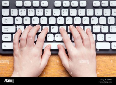 Top View Of Hands Typing On Computer Keyboard Stock Photo Alamy