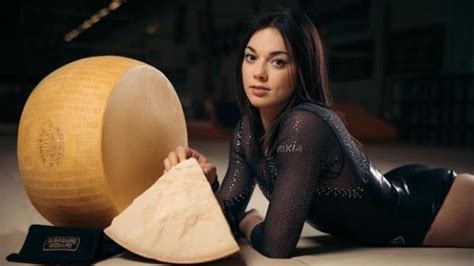 Italian Gymnast Posing With Wheels Of Cheese Is The Olympic Hero The