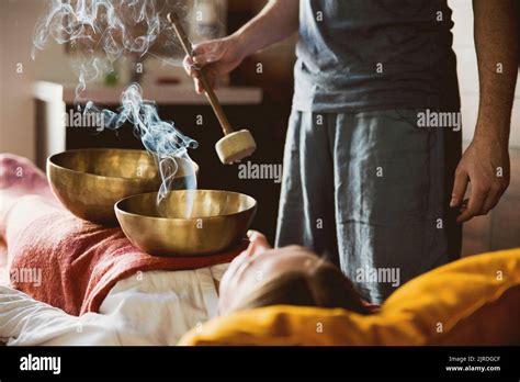 Tibetan Singing Bowls With Smoke In Sound Therapy In Spa Center Stock