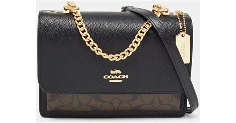 COACH Signature Coated Canvas And Leather Klare Crossbody Bag In Black