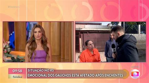 Repórter se emociona ao vivo e abraça moradora de Porto Alegre ao ouvir