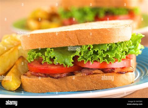 Fresh Homemade BLT Bacon Lettuce And Tomato Sandwich With French