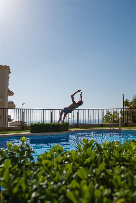 At The Swimming Pool Del Colaborador De Stocksy Milles Studio Stocksy