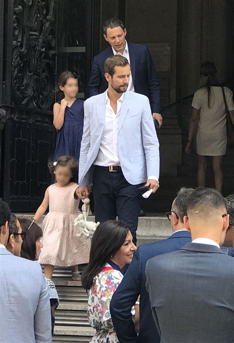 Photo Marc Olivier Fogiel avec son mari François Roelants et leurs