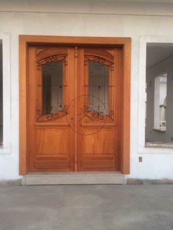 Porta sistema de abrir dupla de madeira maciça de Cedro grade