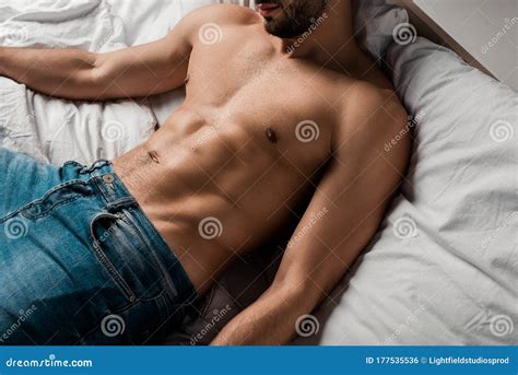 View Of Shirtless Sexy Man Lying Stock Photo CartoonDealer 177535536