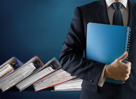 Premium Photo File Folders With Documents And Business Man