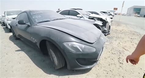 Luxurious Cars Resting In Dust Dubai S Supercars Scrap Yard