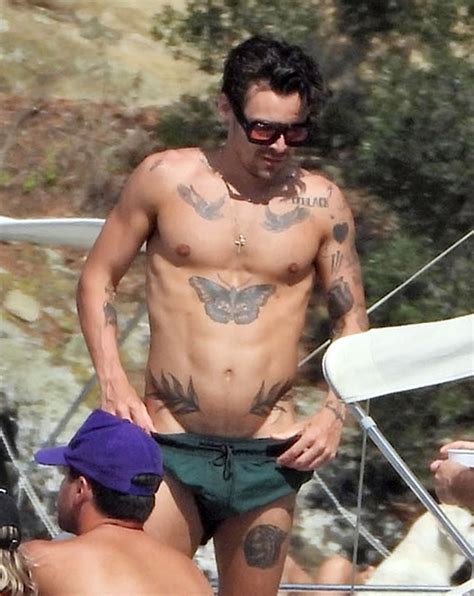 Harry Styles Flashes New Tattoo Seemingly Dedicated To Ex Olivia Wilde