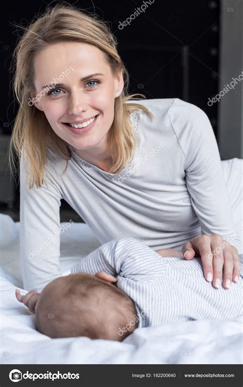 Mother With Sleeping Baby Stock Photo AllaSerebrina 162200640