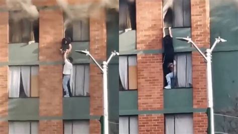 Dramático video muestra el rescate de una chica y su perrito de un